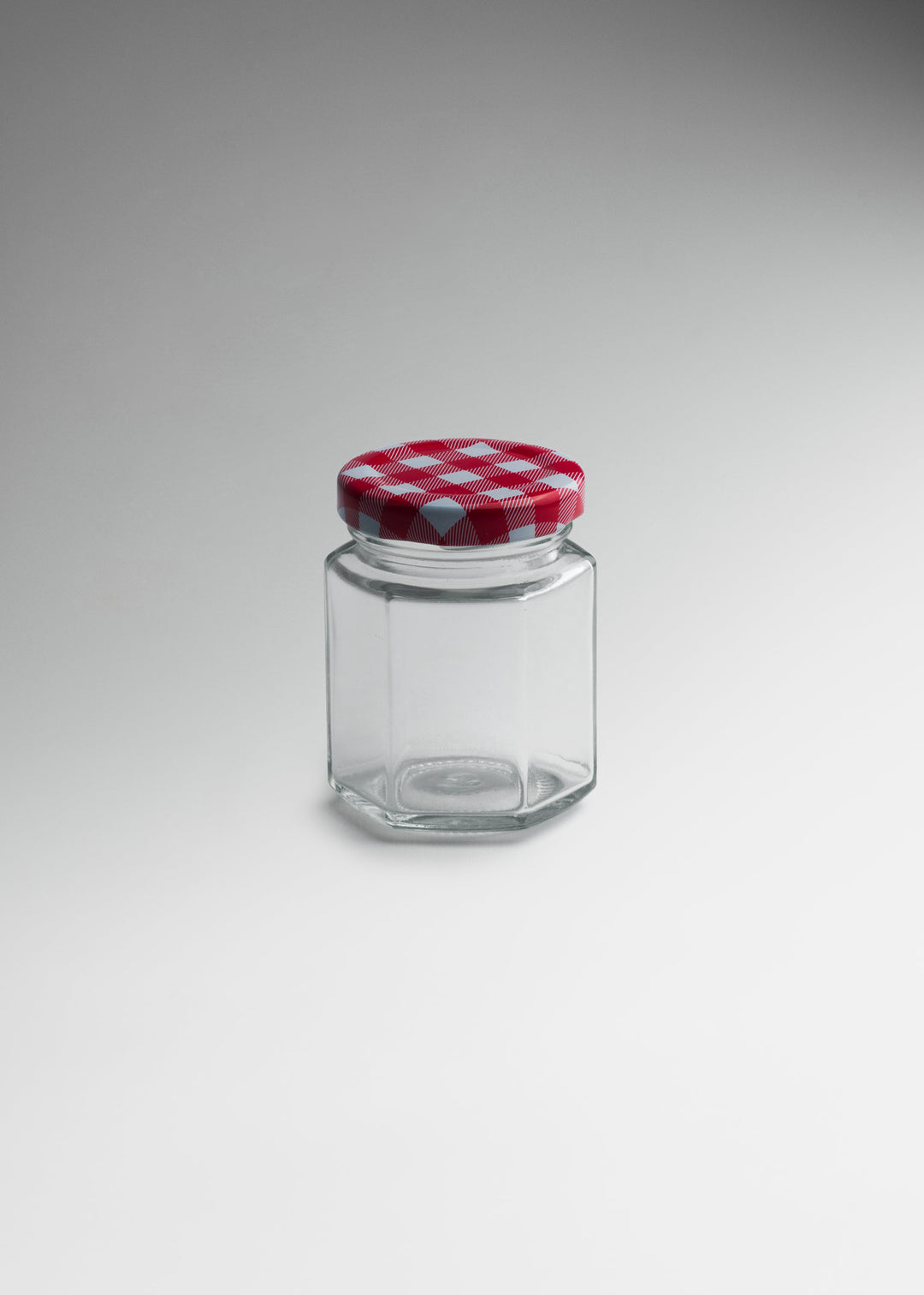 Frasco hexagonal de vidrio con tapa roja 85 ml | Compra en MAHA